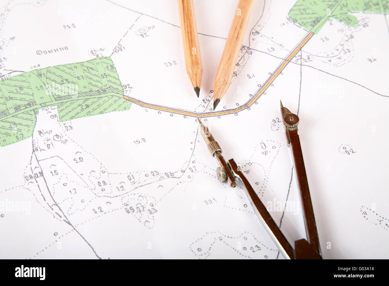 Topographic map of district with a measuring instrument Stock Photo - Alamy