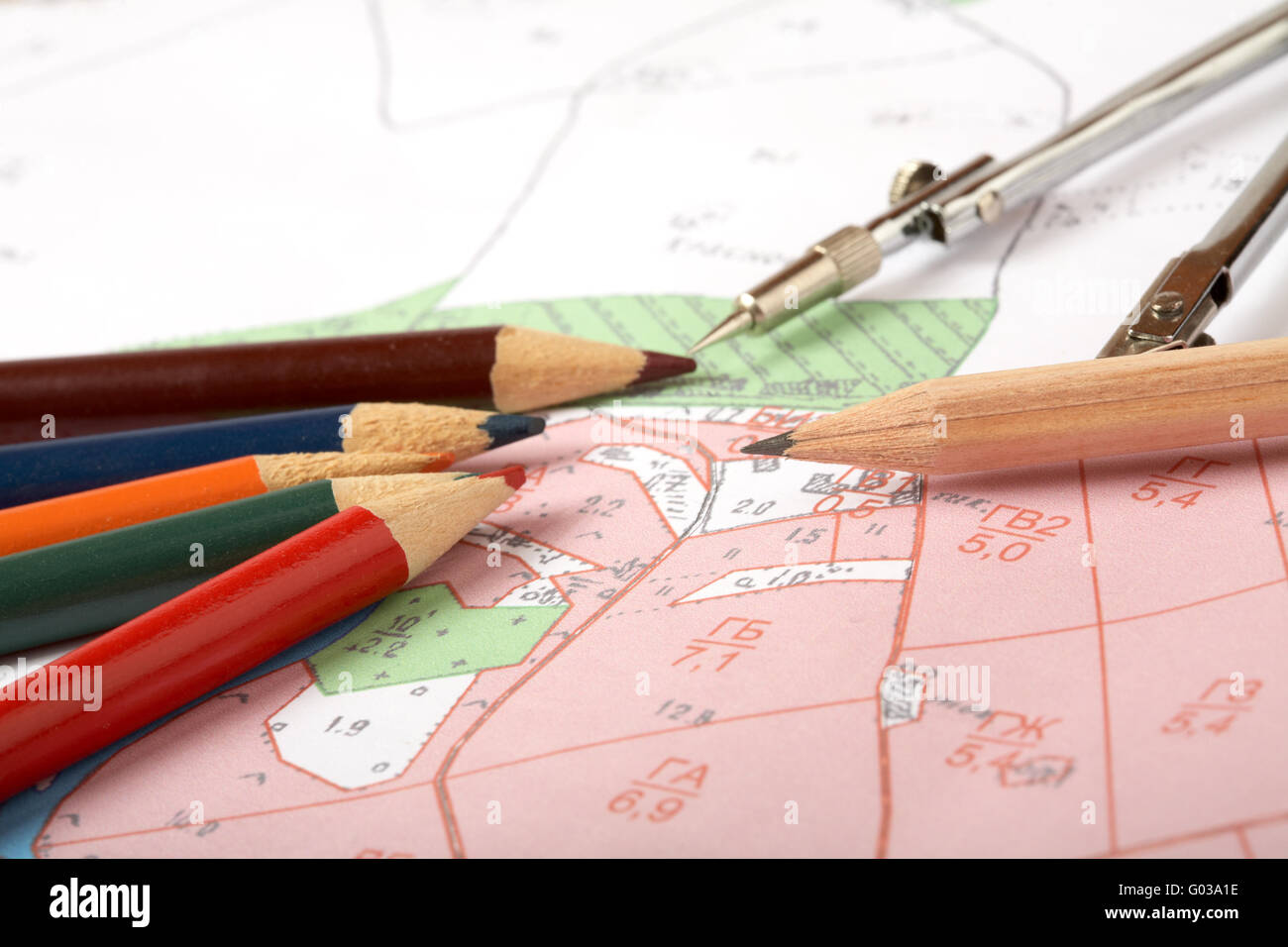 Topographic map of district with a measuring instrument Stock Photo - Alamy