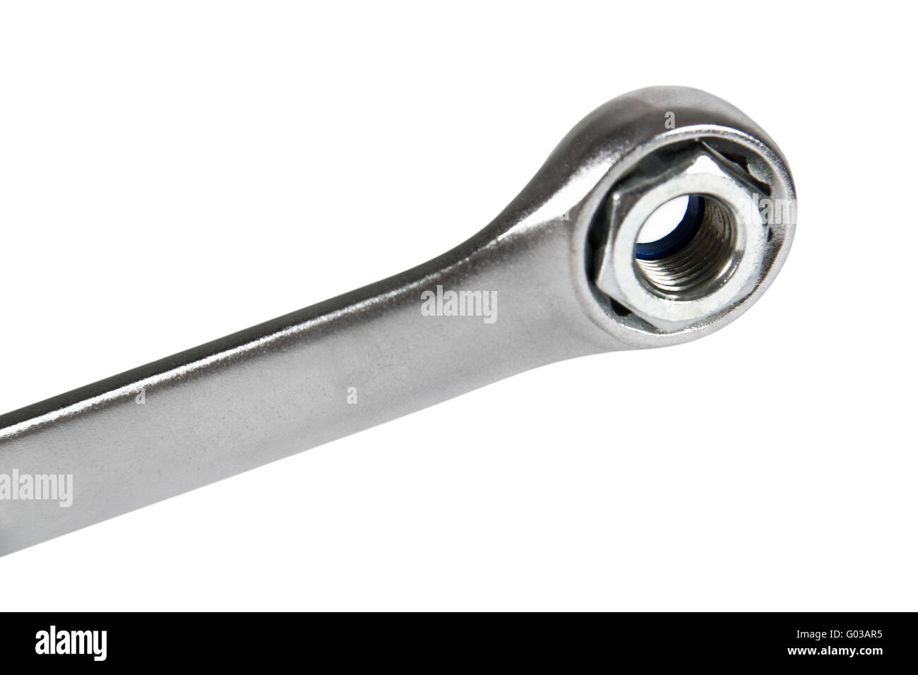 The image of a wrench with a nut, isolated, on a white background Stock ...
