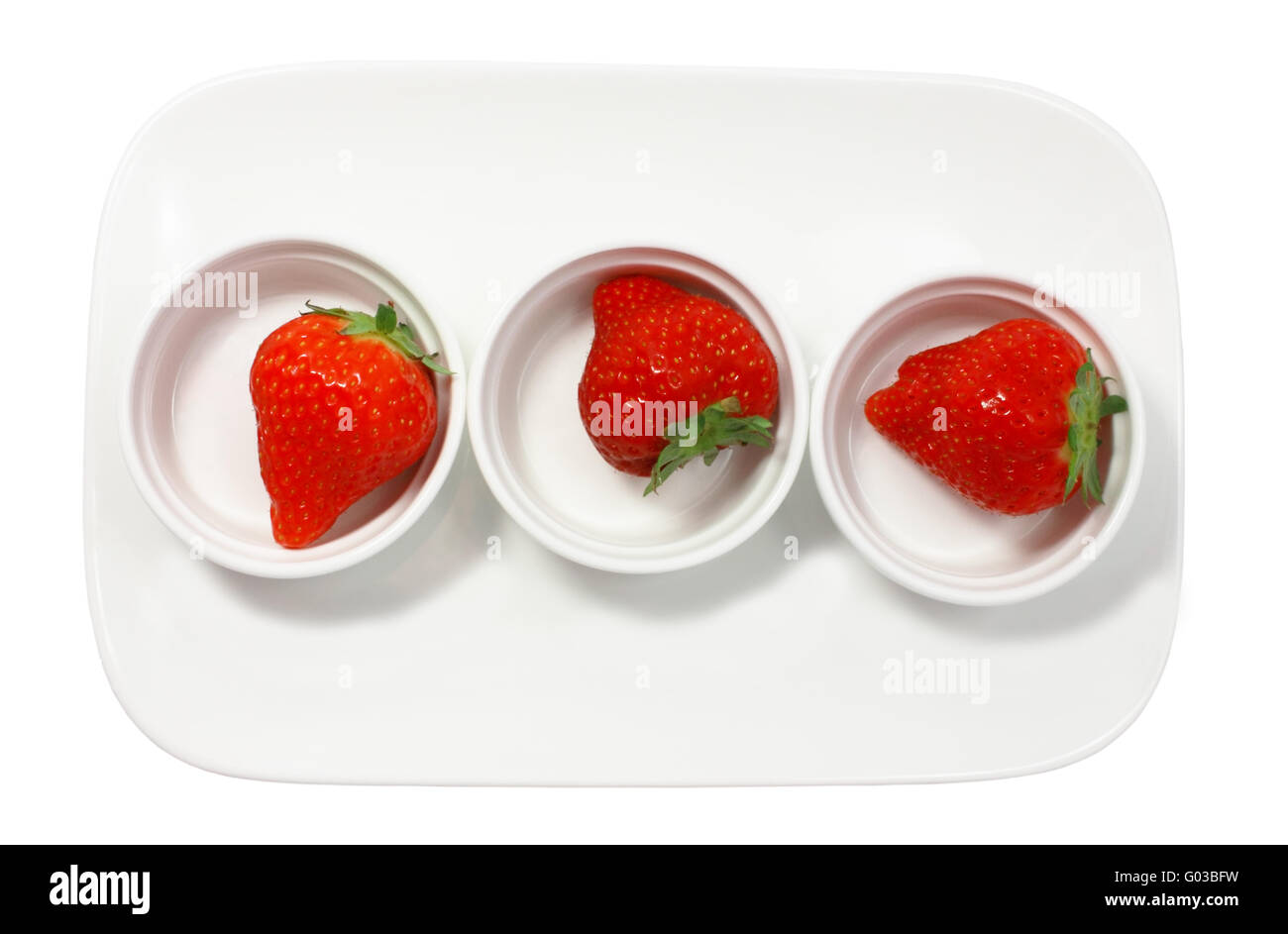 three fresh juicy strawberry Stock Photo - Alamy