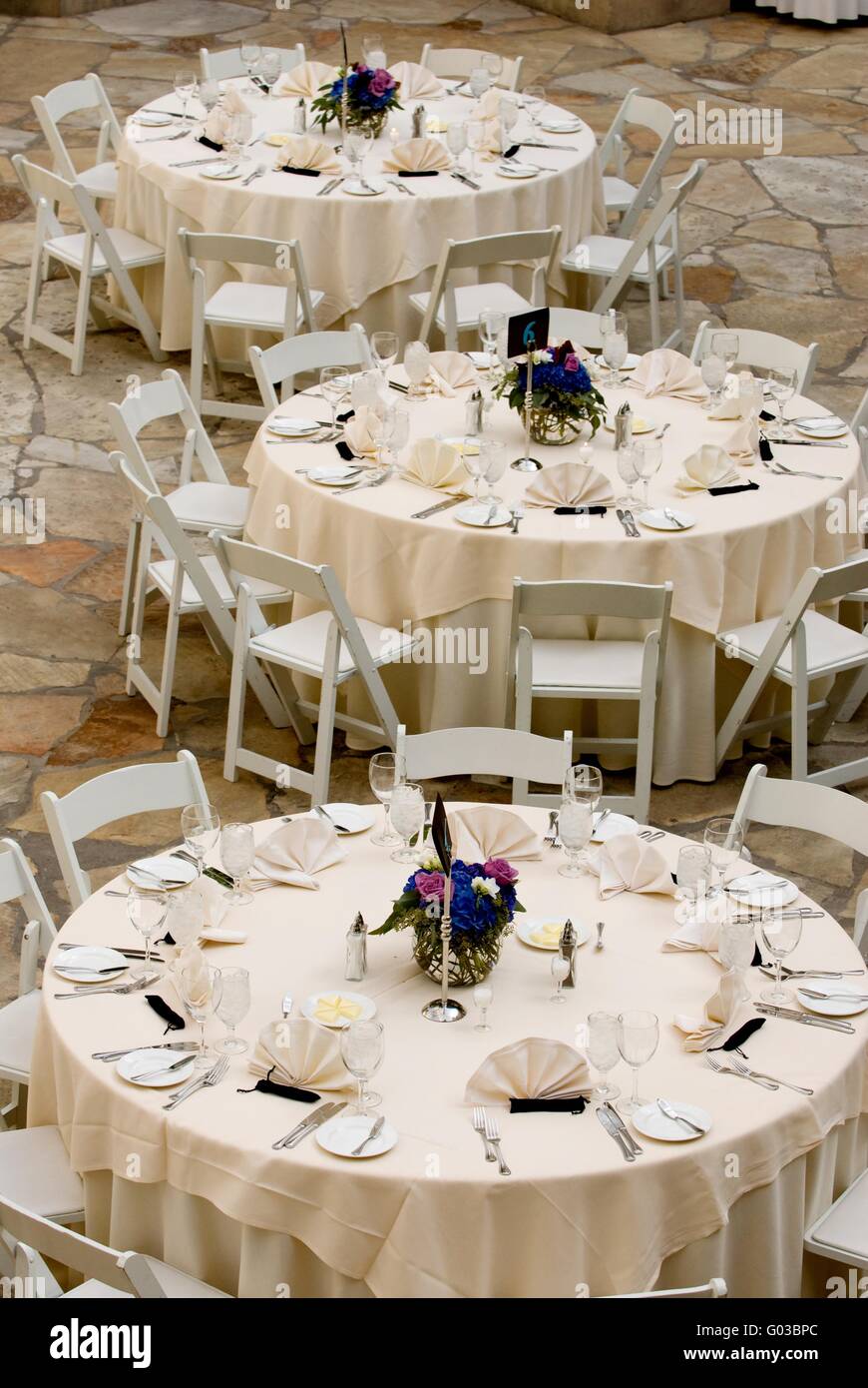image of tables set for an event Stock Photo - Alamy