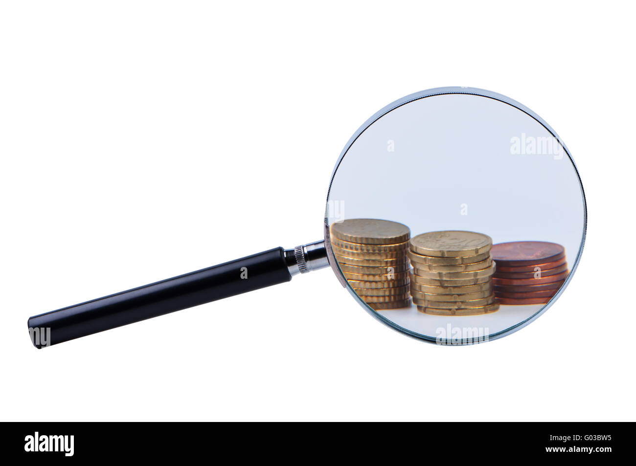Magnifier and coins isolated on white background Stock Photo - Alamy
