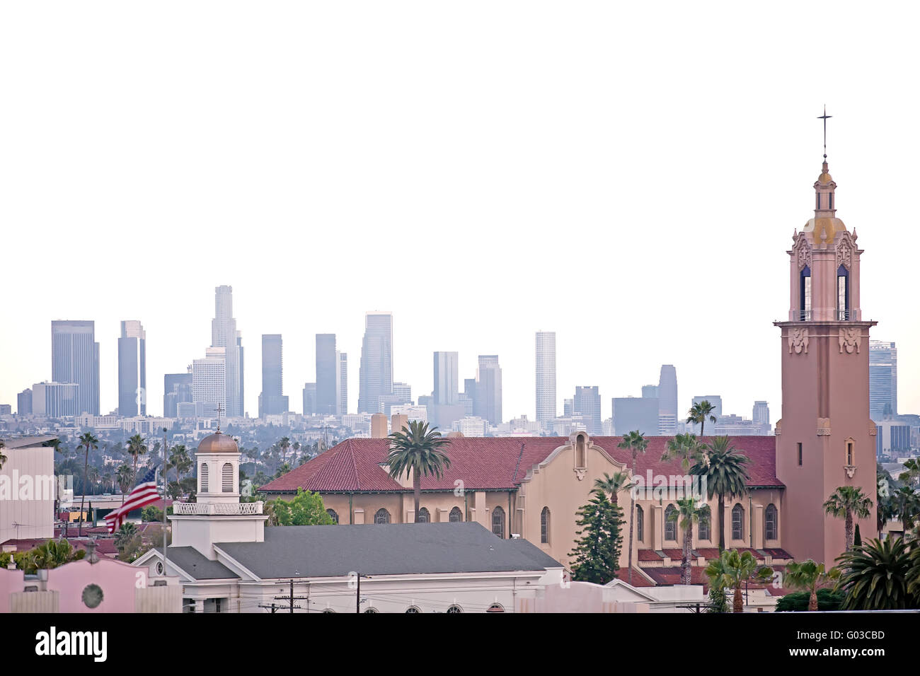 Modern downtown cityscape with church in front Stock Photo - Alamy