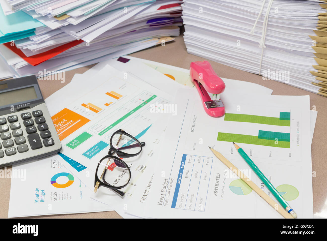 Analysis chart and paperwork on office table Stock Photo - Alamy