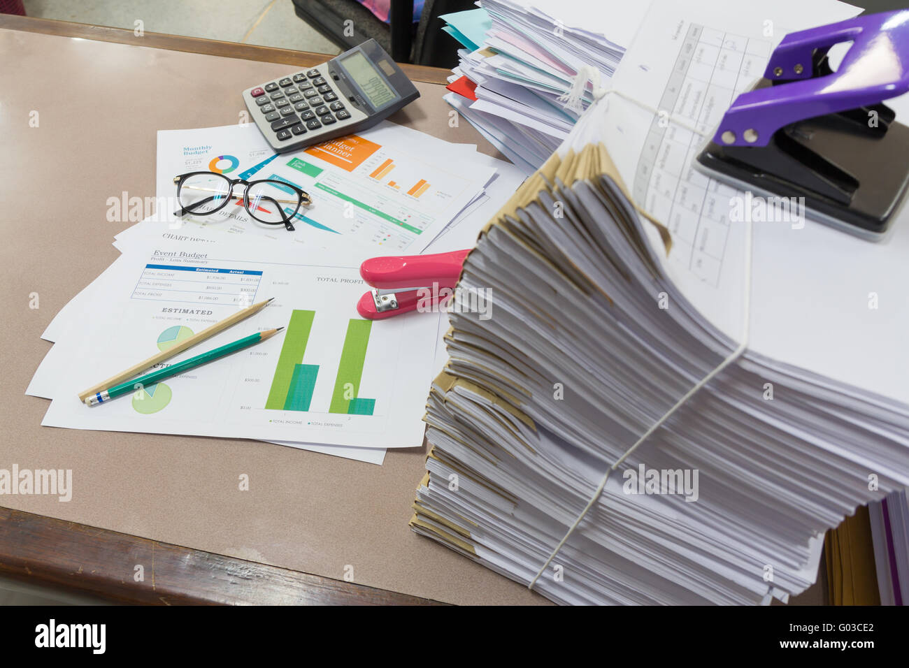 Analysis chart and paperwork on office table Stock Photo - Alamy