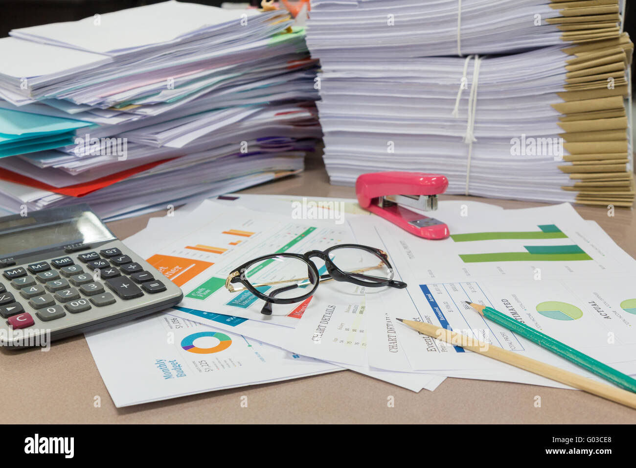 Analysis chart and paperwork on office table Stock Photo - Alamy
