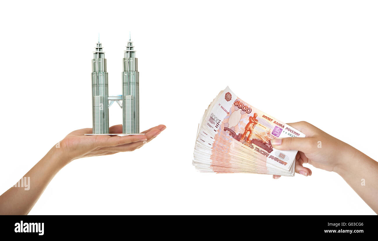 Model skyscraper Petronas Twin Towers and a pack of five thousandth of ...