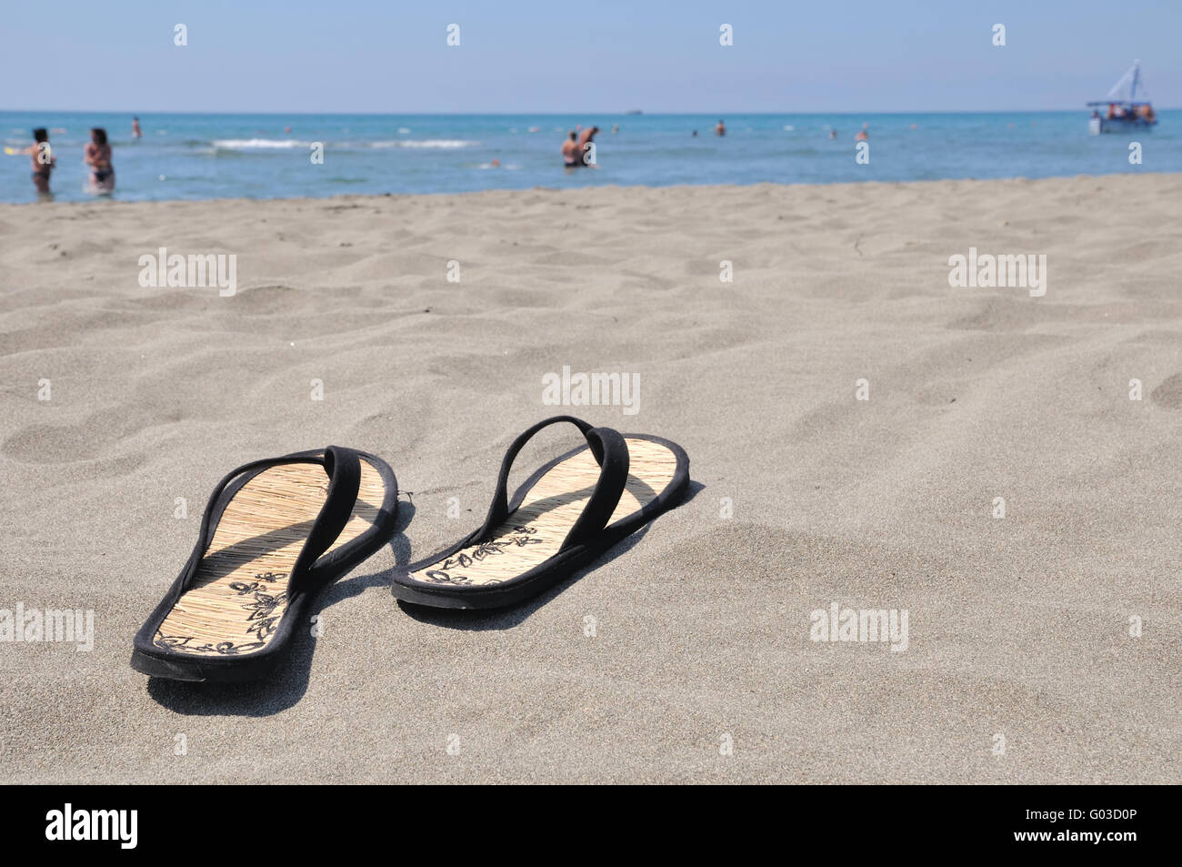 Slippers on beach Stock Photo - Alamy
