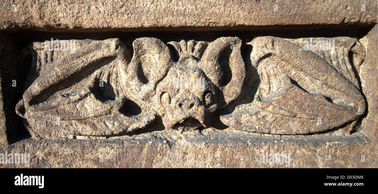 bat in stone at wall Stock Photo - Alamy