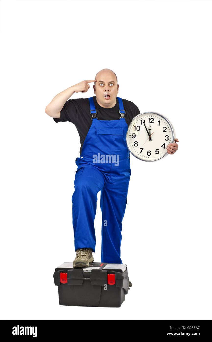 Construction workers with a clock in his hand Stock Photo - Alamy