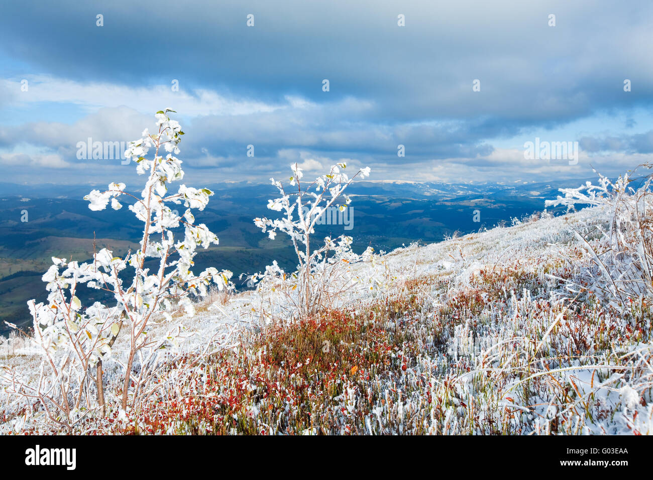 First winter snow on autumn mountain plateau Stock Photo - Alamy