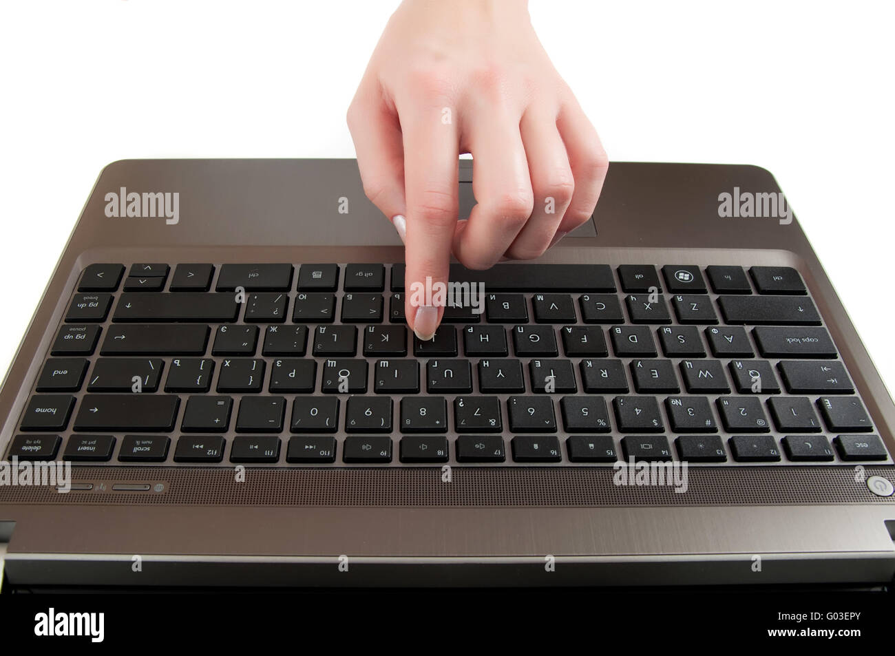 female hand pushing a button on laptop keyboard with the finger Stock ...