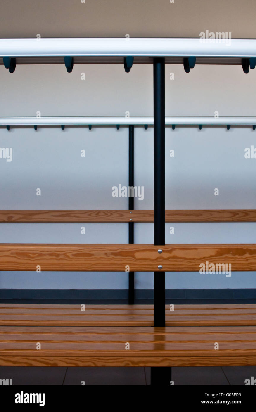 Bench and coat hooks in a locker room Stock Photo - Alamy