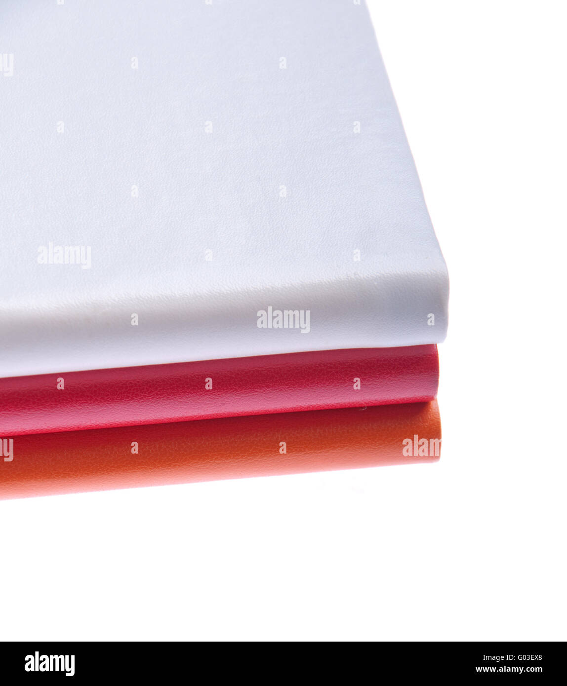 pile of colored notebooks (isolated on white background Stock Photo - Alamy