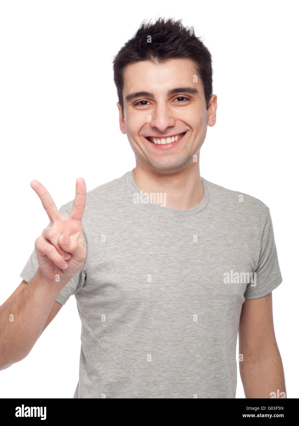 Victory sign positive young man hi-res stock photography and images - Alamy
