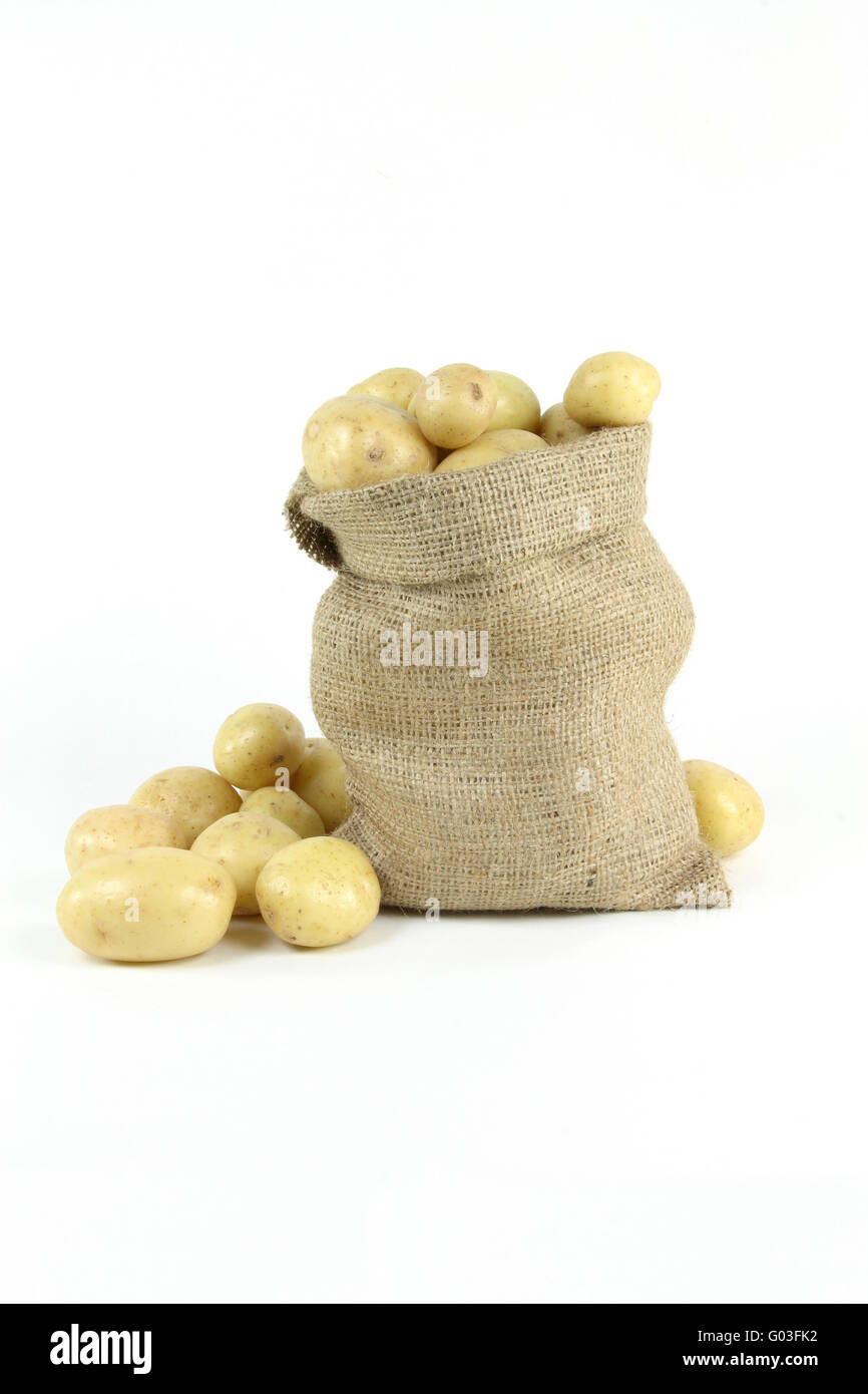 White fresh mini potatoes - vertical orientation Stock Photo - Alamy