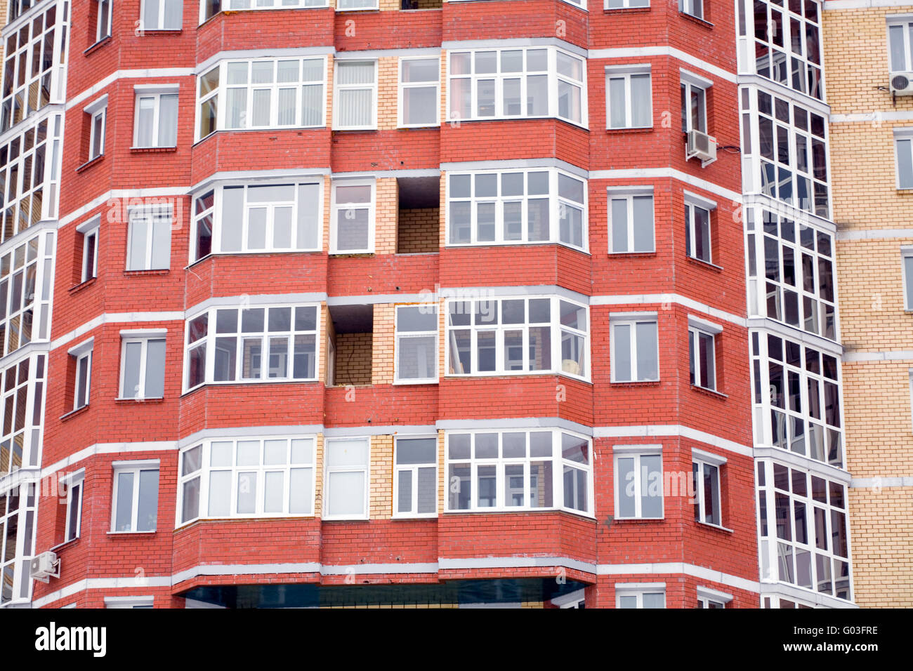 Apartment house windows in residential district of Stock Photo - Alamy