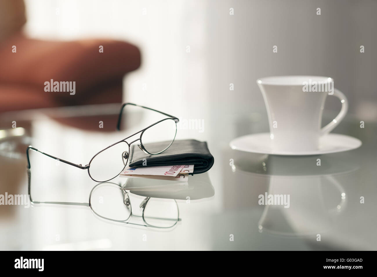 Still life with glasses, wallet and coffee cup on Stock Photo - Alamy