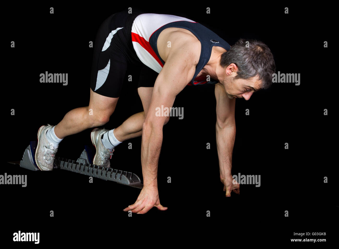 Sprintstart in track and field Stock Photo - Alamy