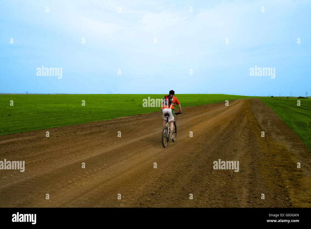 mountain bike race on ground road in the field Stock Photo - Alamy