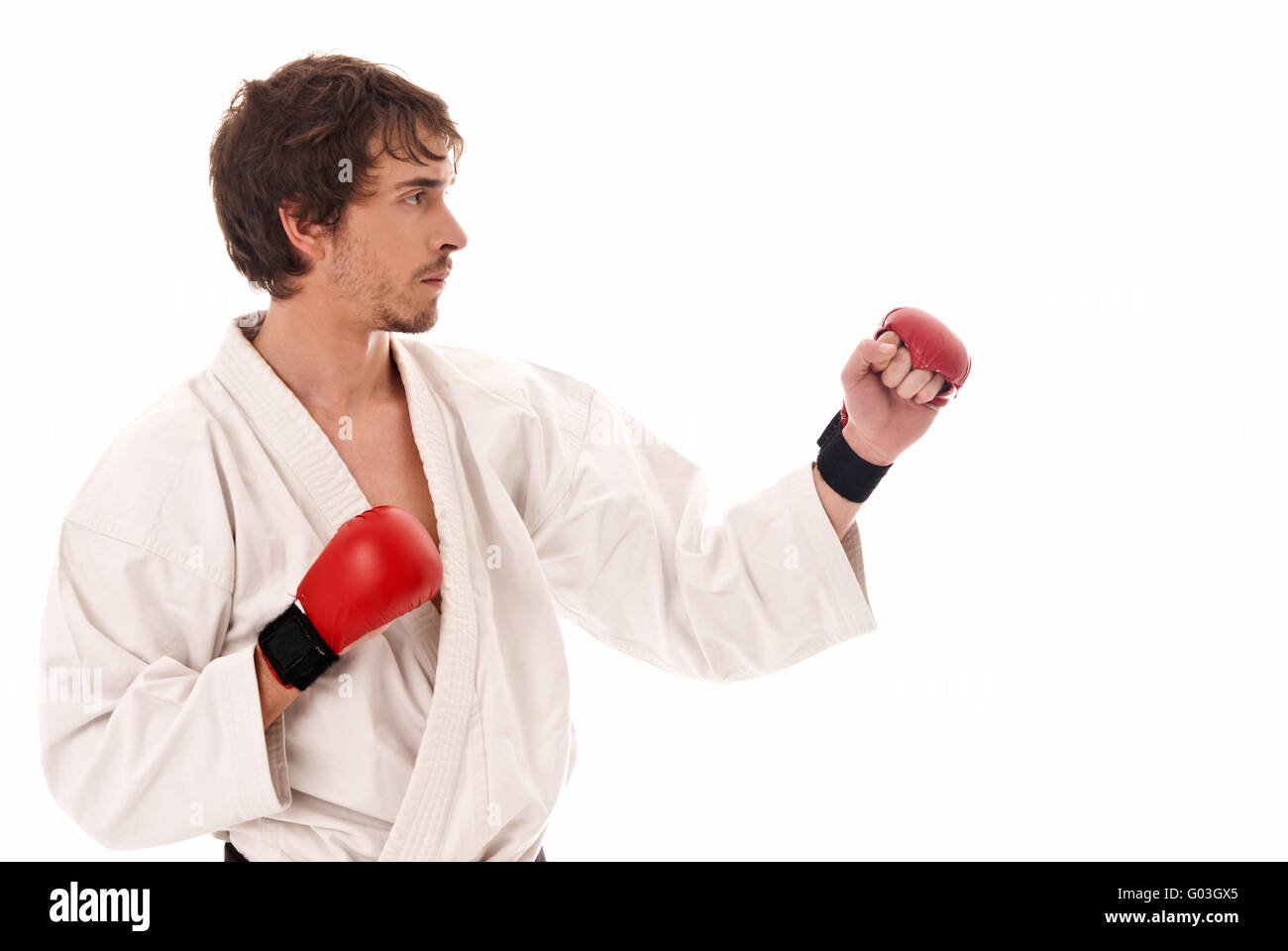 Karate male fighter young isolated on white background Stock Photo - Alamy