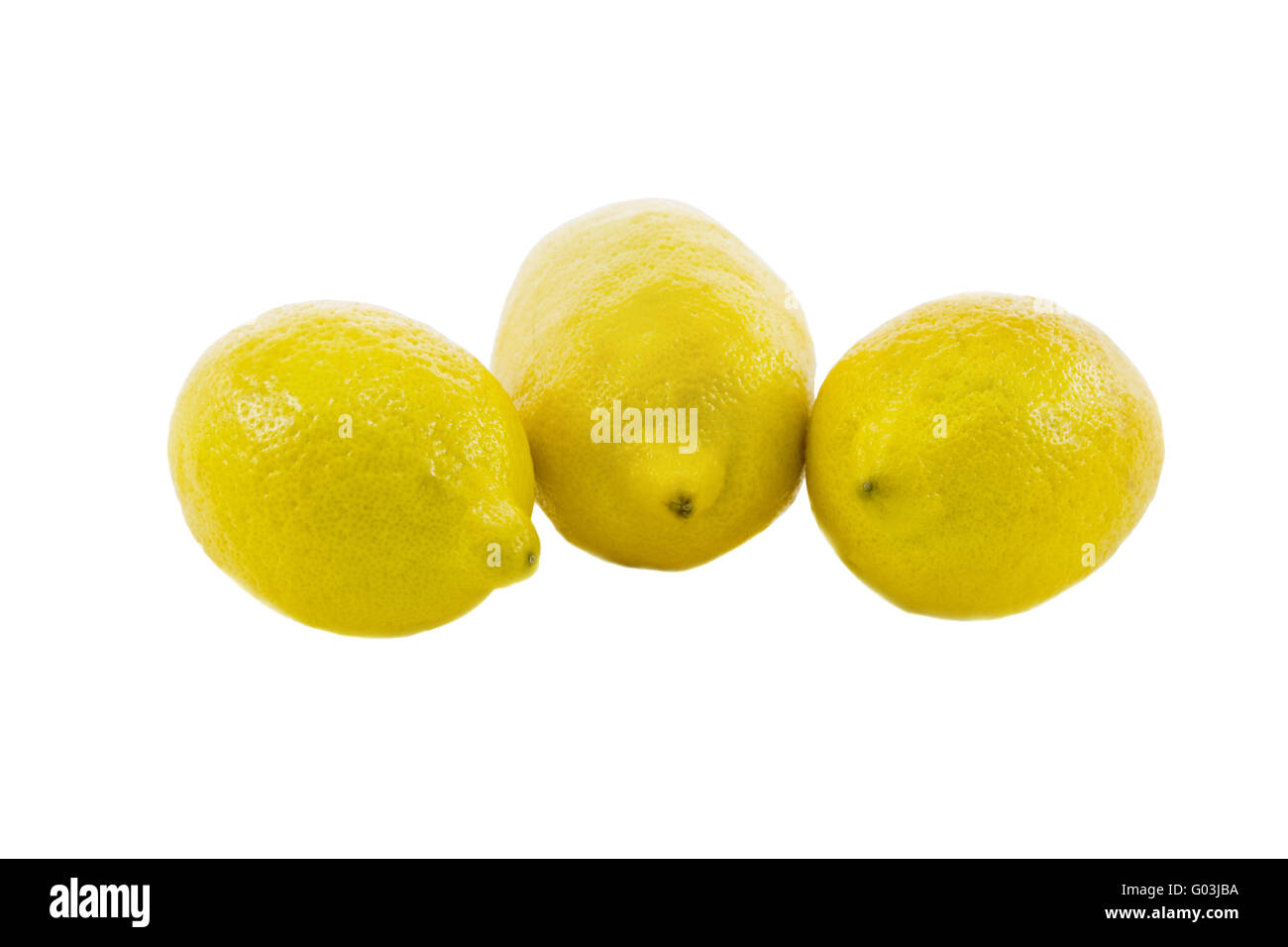 Three fresh yellow lemon isolated over white background Stock Photo - Alamy