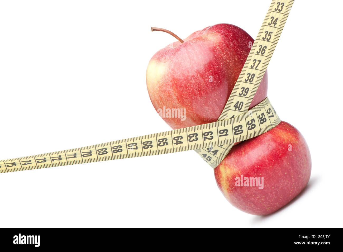 Closeup of a red apple with a measuring tape. Isolated on white Stock ...