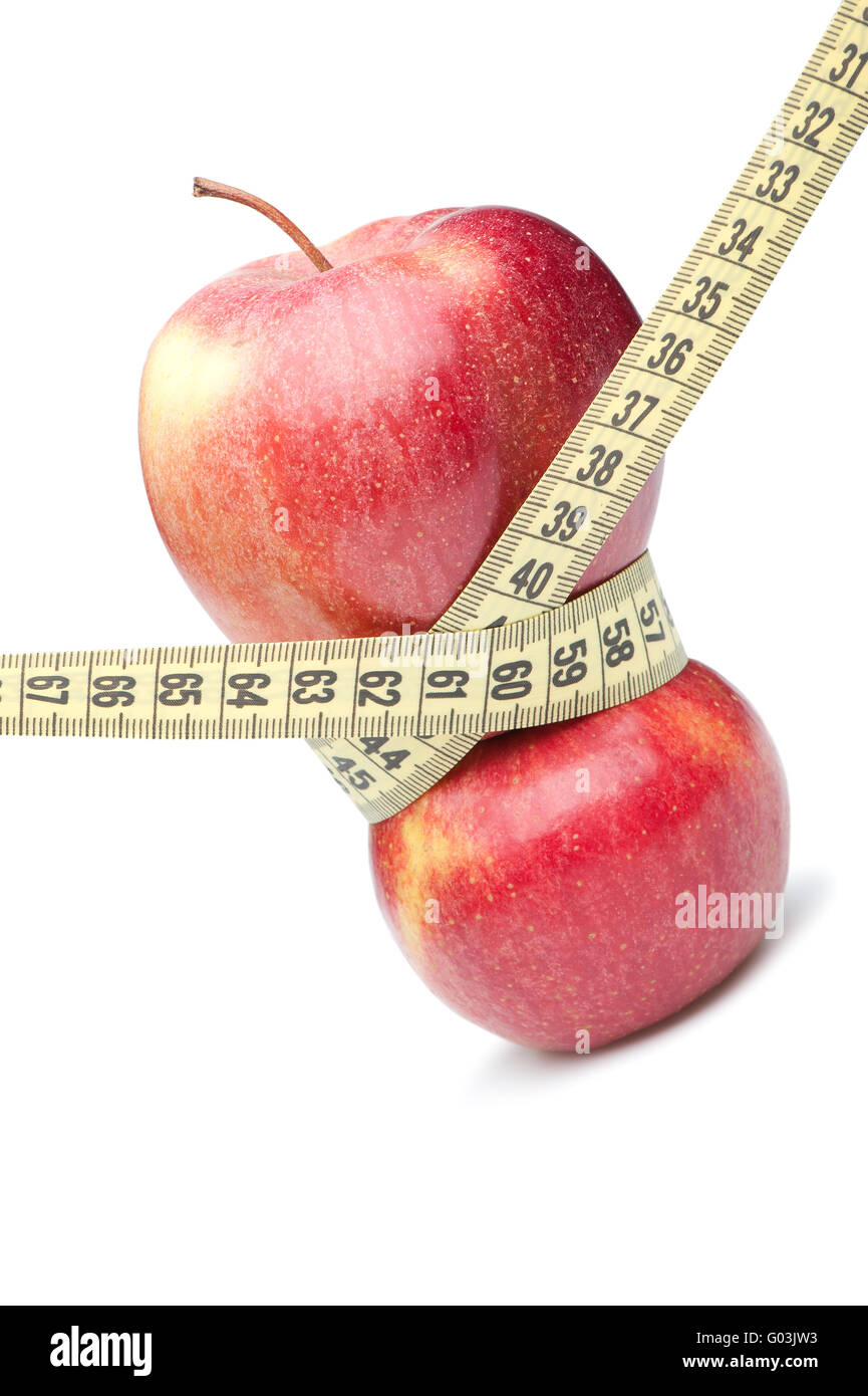 Closeup of a red apple with a measuring tape. Isolated on white Stock ...