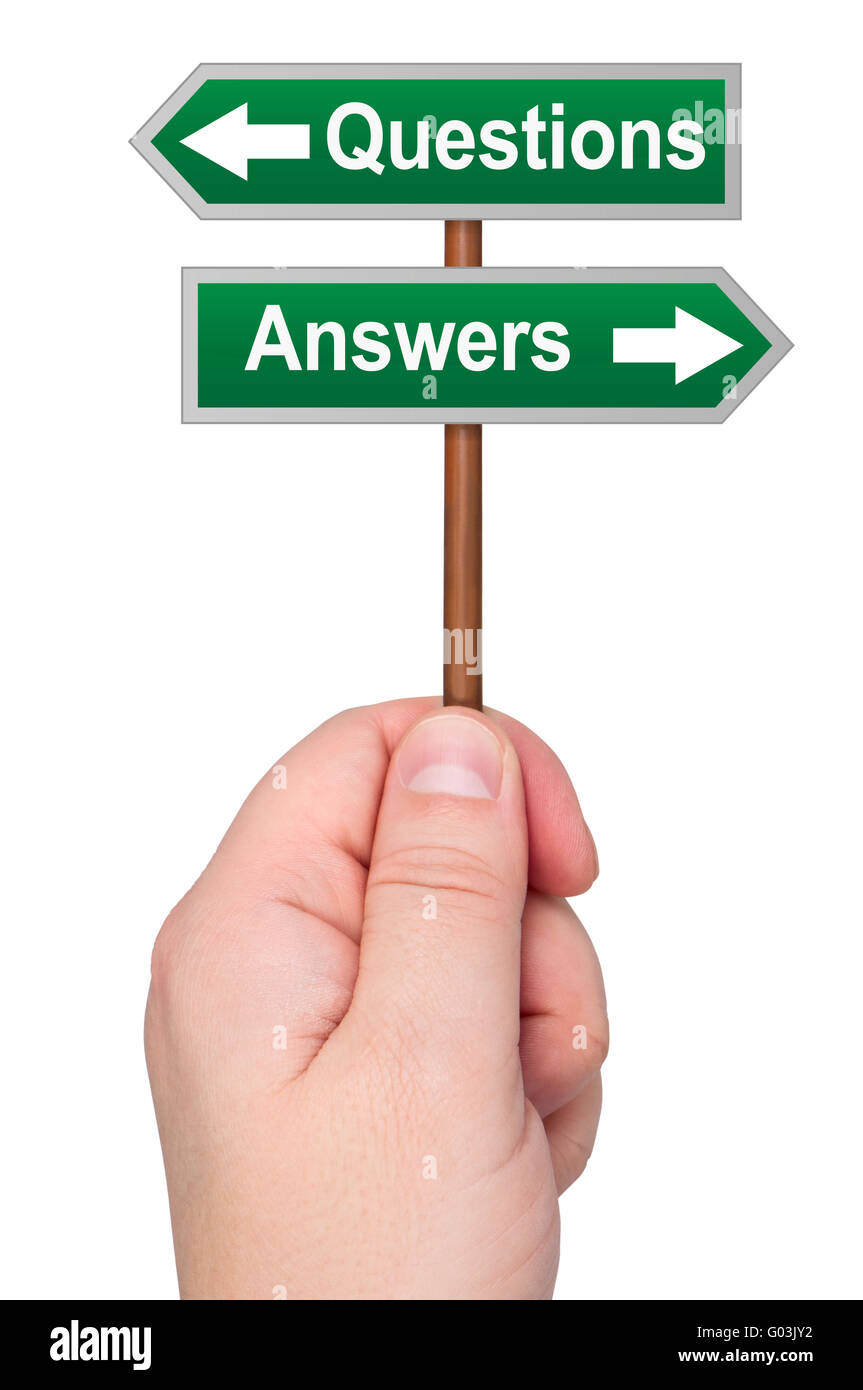 Hand holding road sign with directions Questions Answers Stock Photo ...