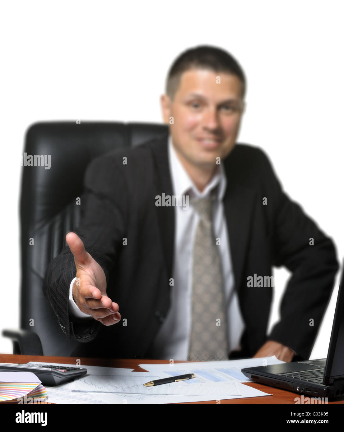 The businessman with salutatory gesture on the workplace Stock Photo ...