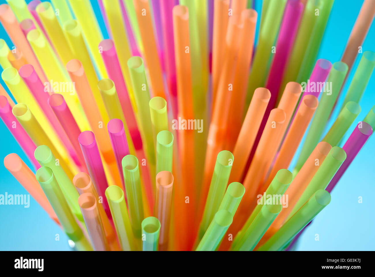 Multicolor flexible straws in the glass closeup Stock Photo - Alamy
