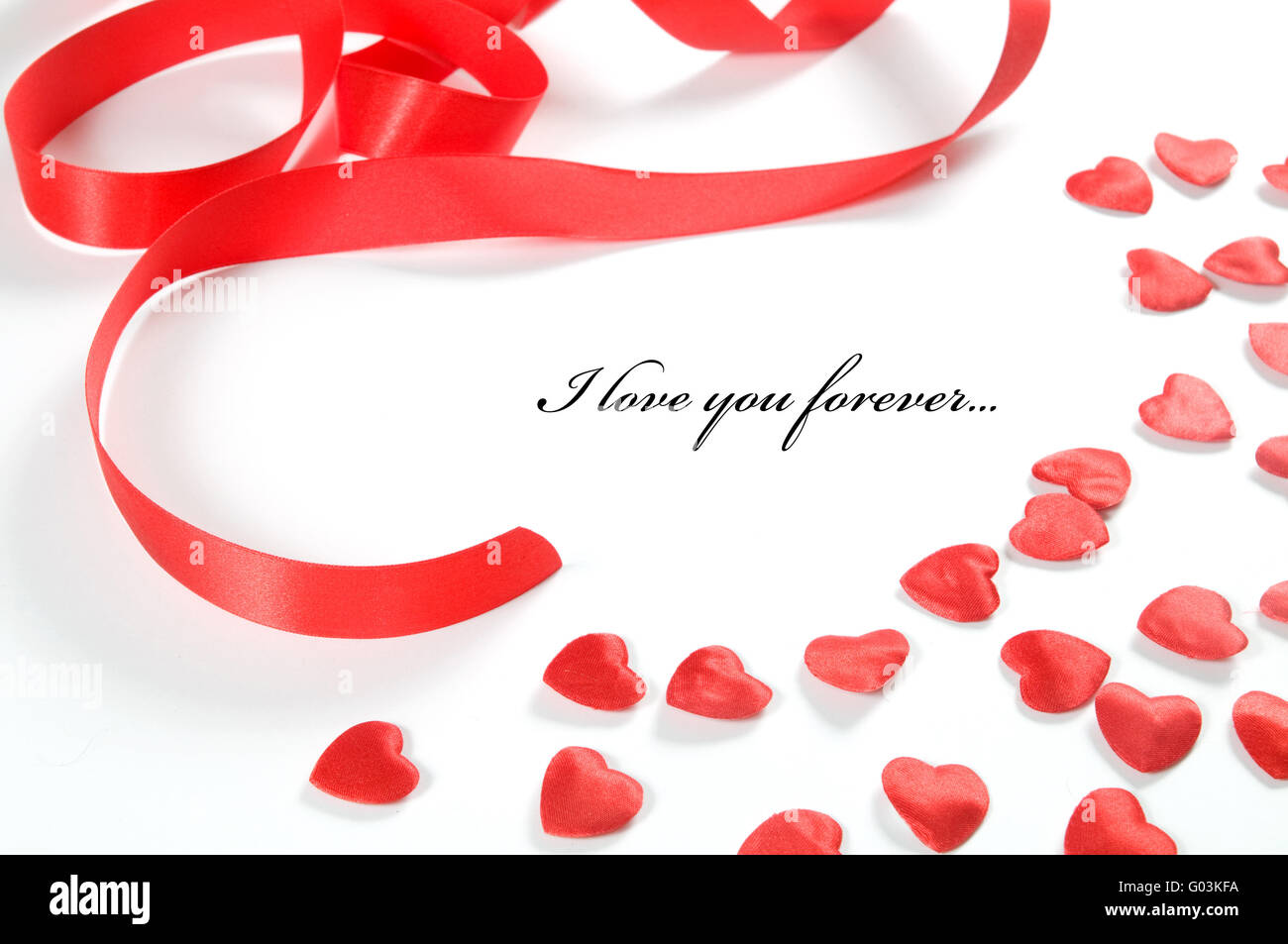 Small red hearts and ribbon on white background. Composition for themes ...