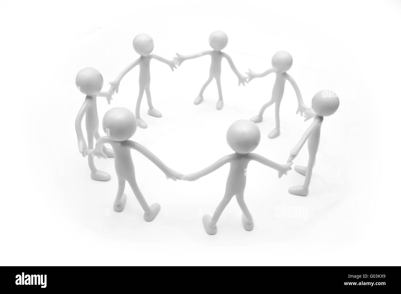 Teamwork concept. Three human figures together Stock Photo - Alamy