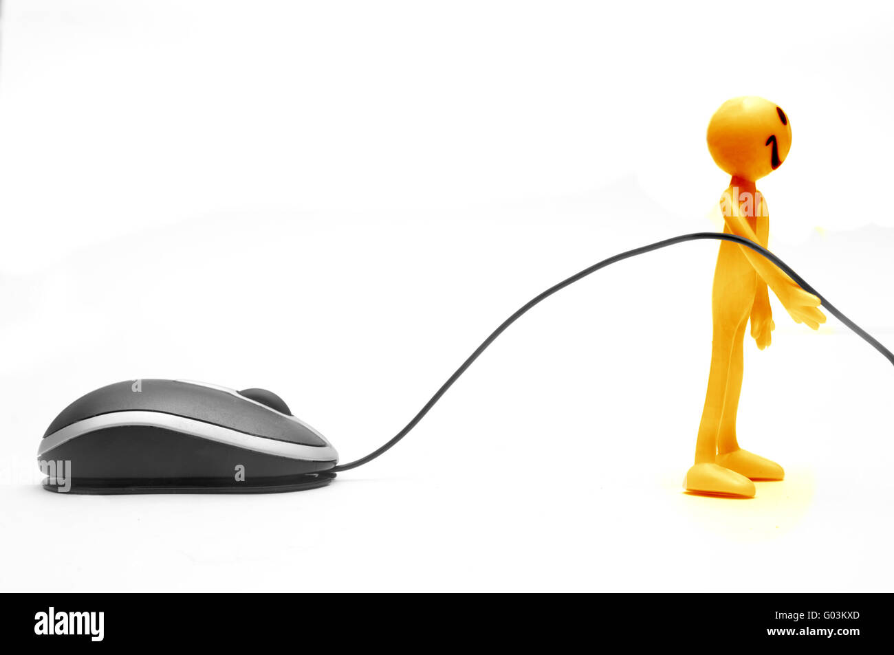 Smiling face pulling a computer mouse. Conceptual Stock Photo - Alamy