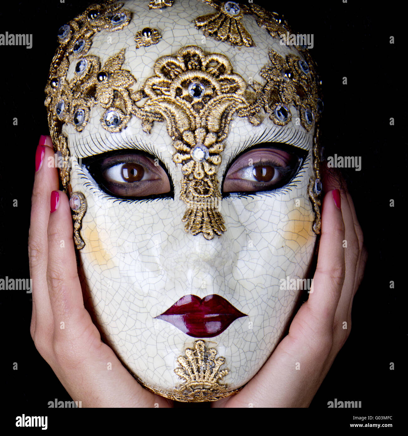 Woman wearing masquerade mask hi-res stock photography and images - Alamy