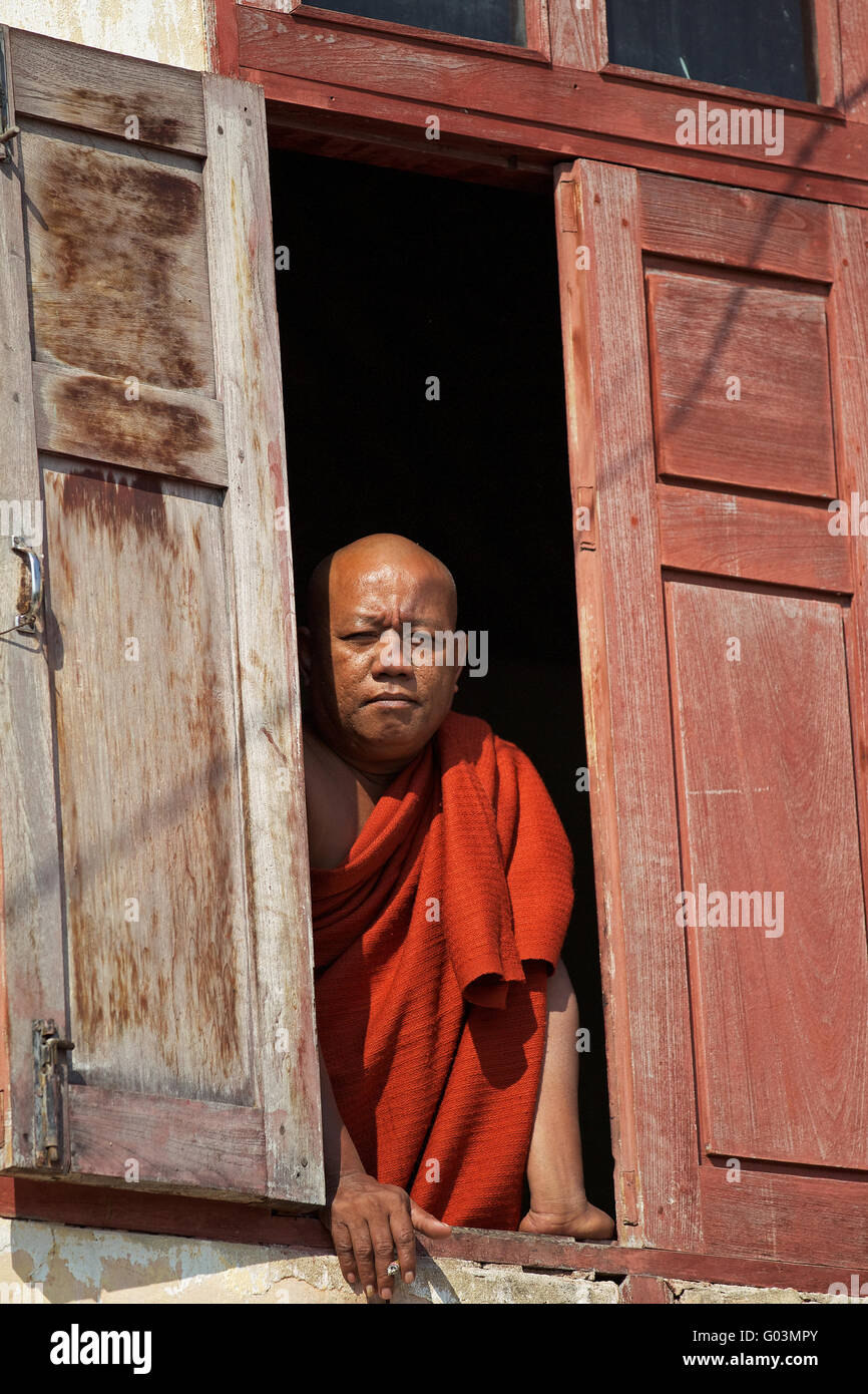 Window with a Monk, Myanmar Stock Photo - Alamy
