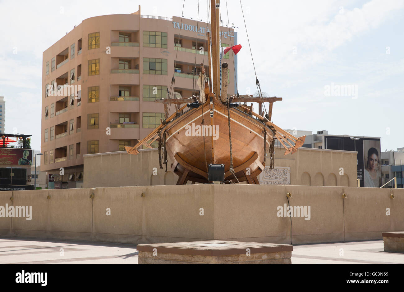 Old wooden boat called a Dhow outside the Dubai museum in UAE Stock ...