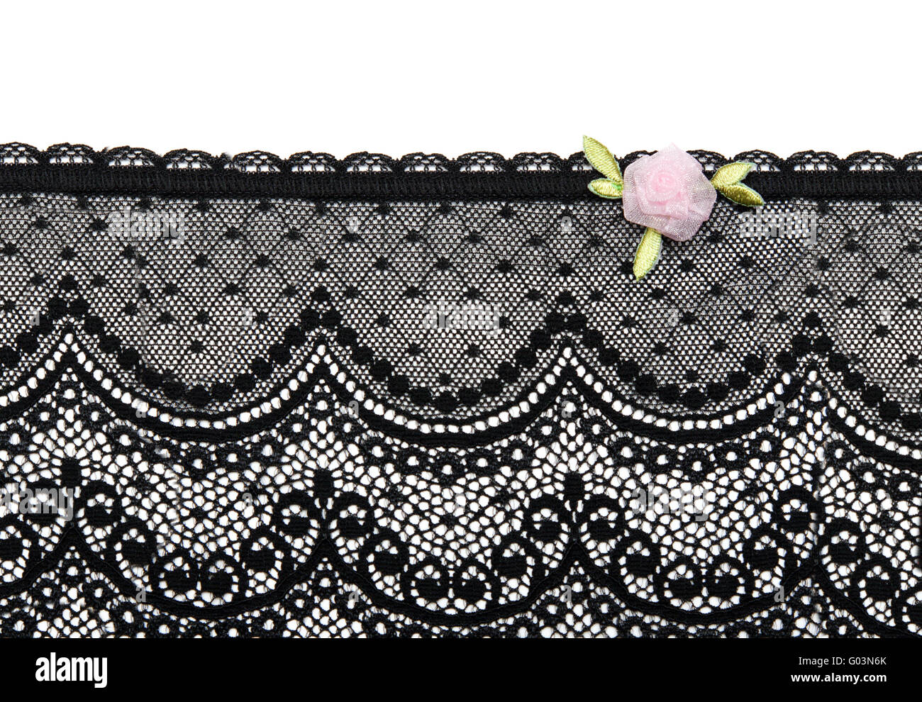 Black lace with rose satin flower on white background Stock Photo - Alamy