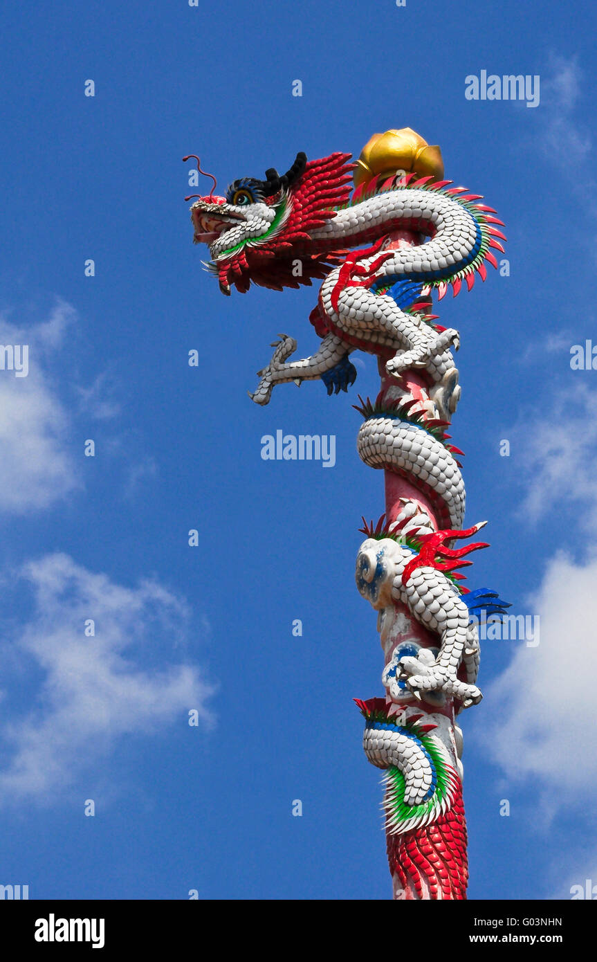 Dragon winding around the pole Stock Photo - Alamy