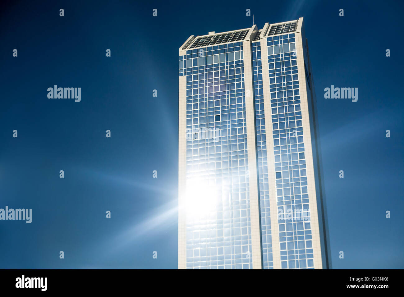 Skyscraper on a background of clear blue sky Stock Photo - Alamy