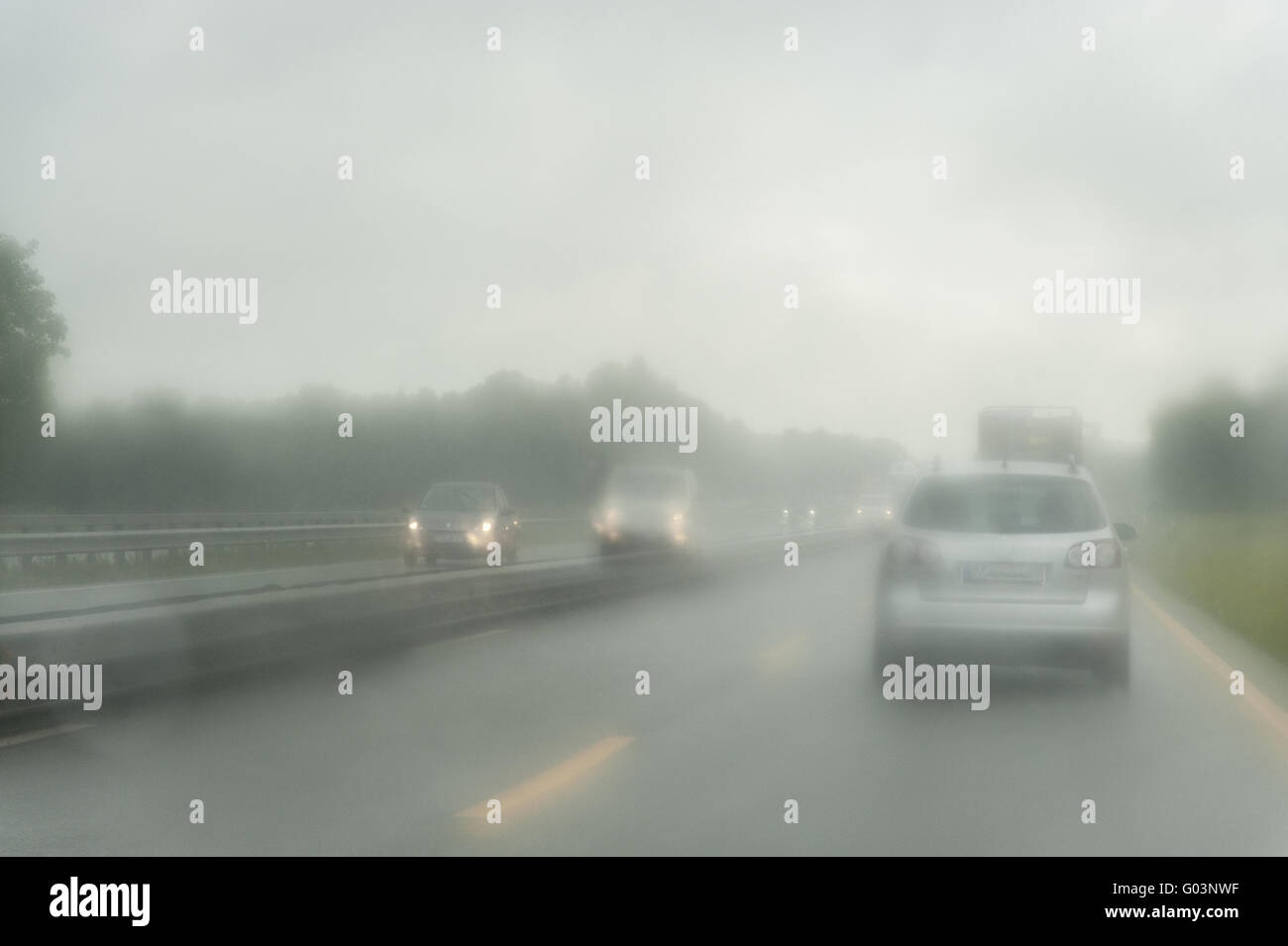 Looking through the windshield of a car in the rai Stock Photo - Alamy