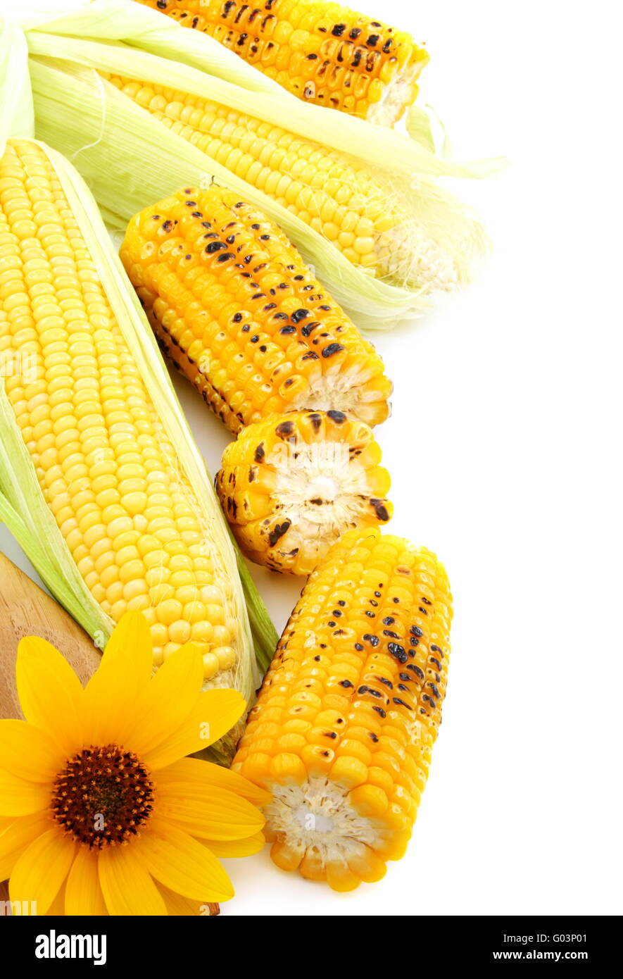 Flower,grilled corn and fresh cobs with green leaves Stock Photo - Alamy