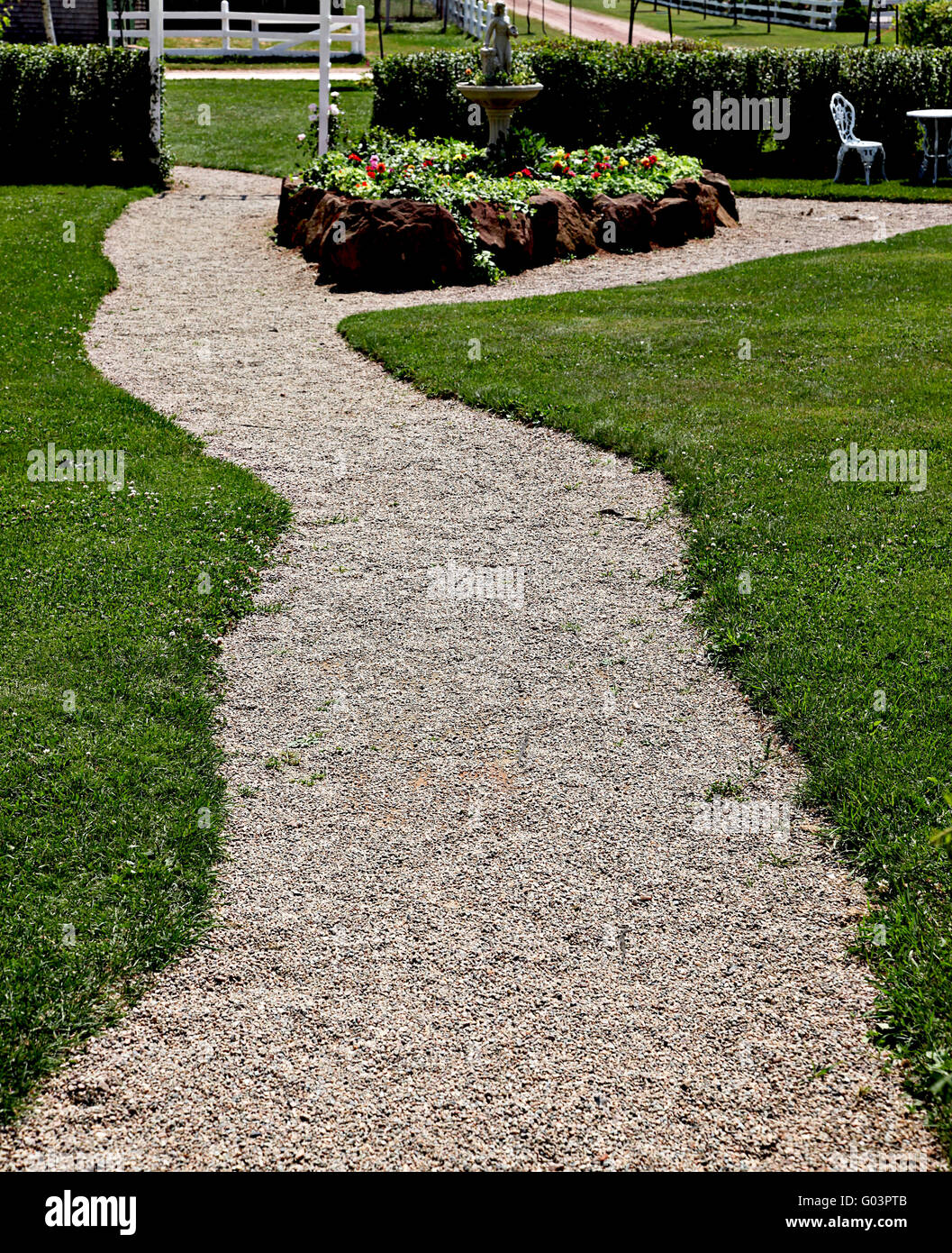 Stone walkway winding in garden Stock Photo - Alamy