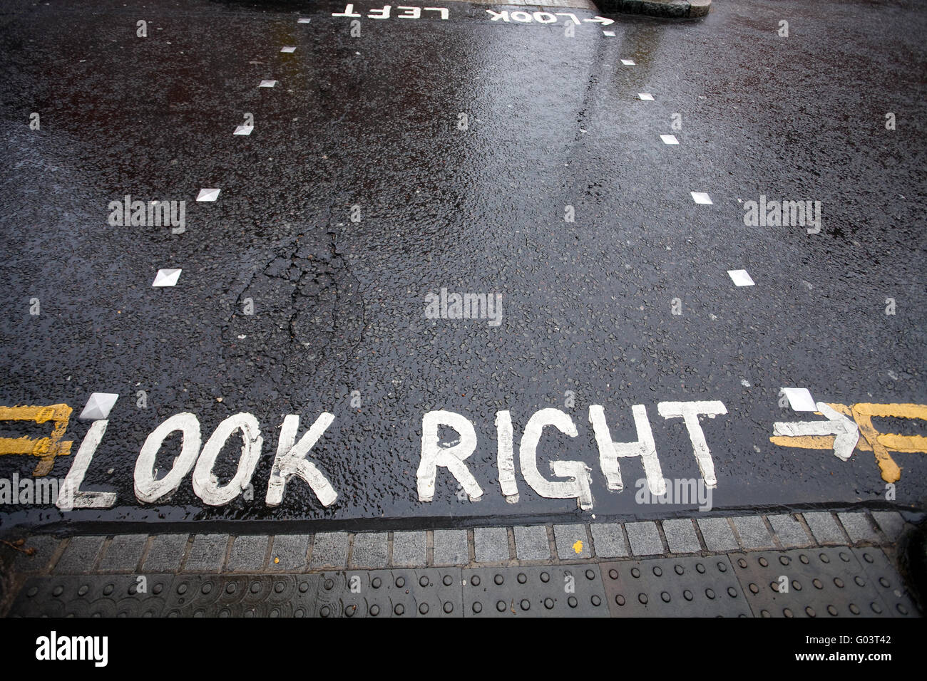 Pedestrian crossing look left sign hi-res stock photography and images ...