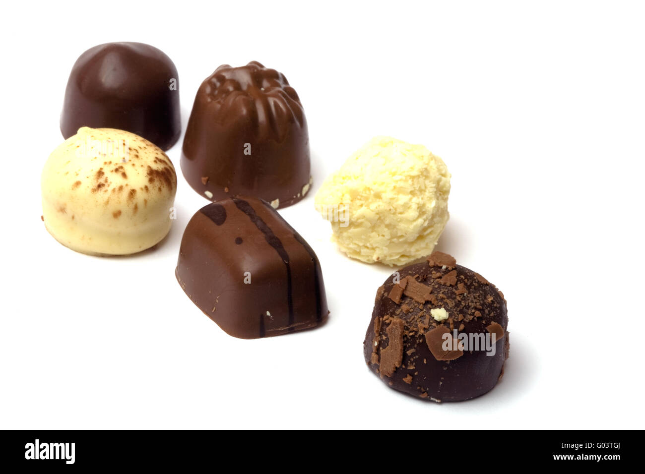 chocolate truffle in white background - focus on first Stock Photo - Alamy