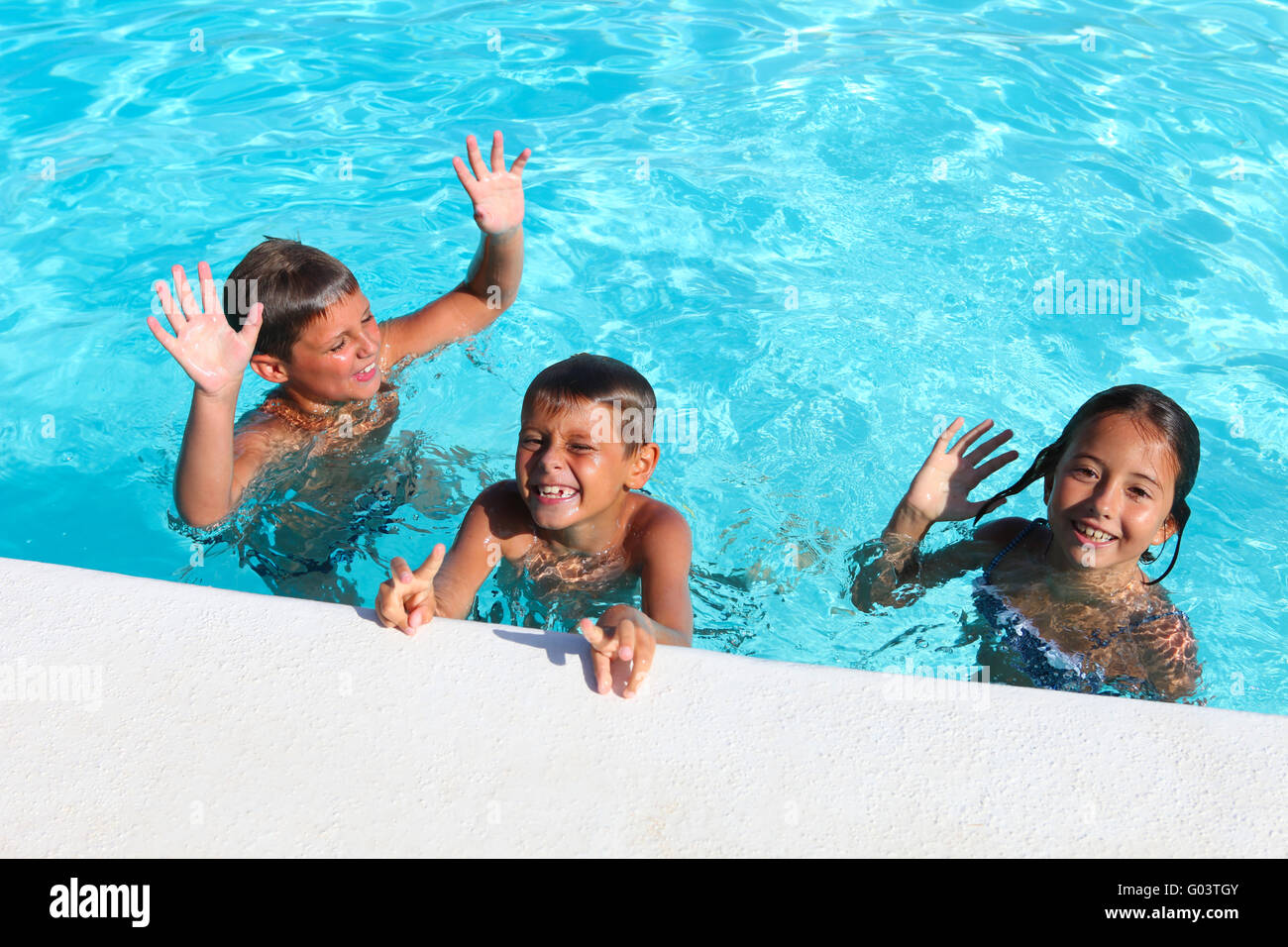 children playing in a pool Stock Photo - Alamy