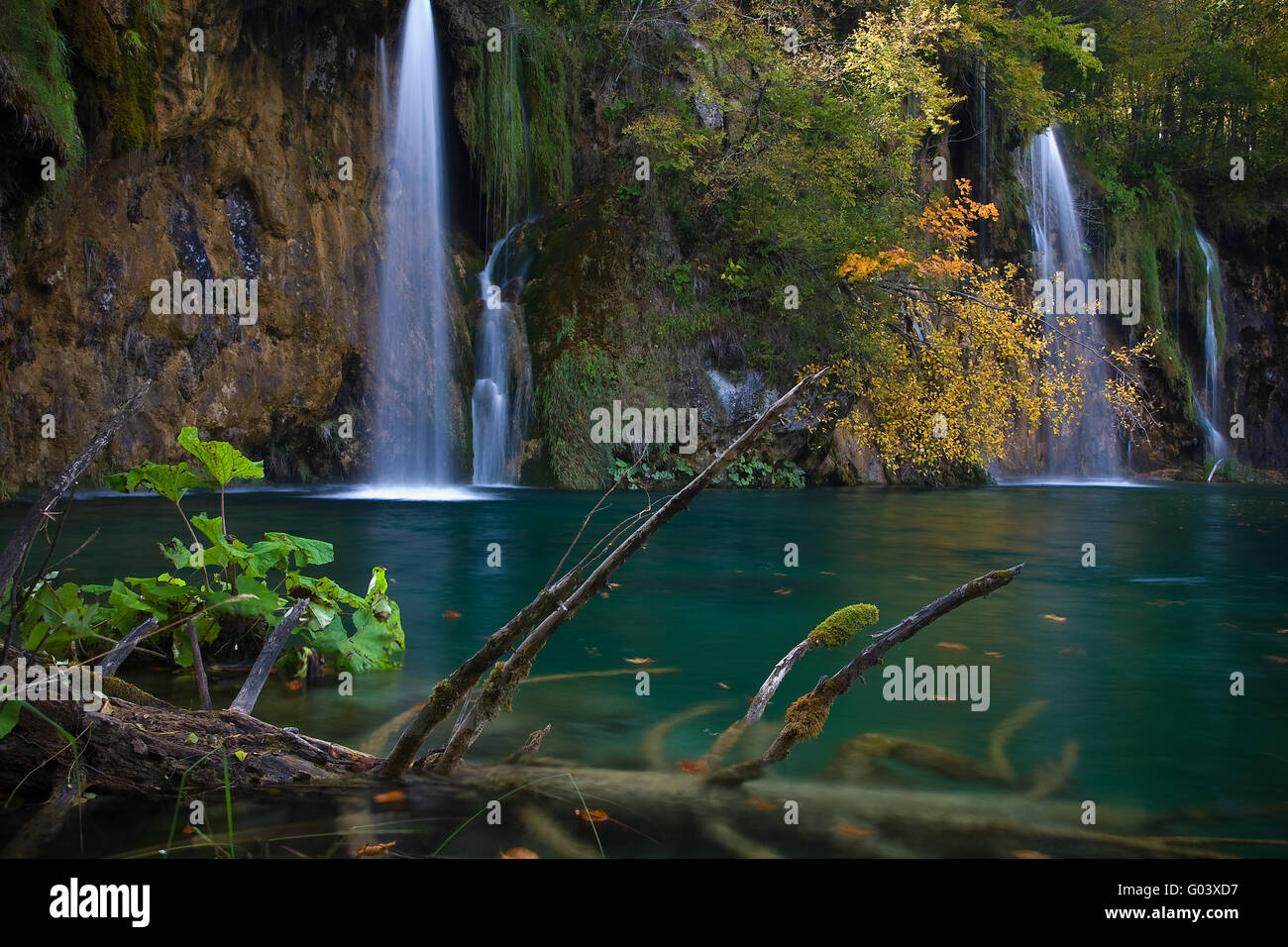Waterfall on a lake Stock Photo - Alamy