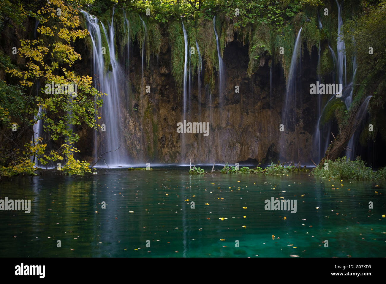Waterfall on a lake Stock Photo - Alamy