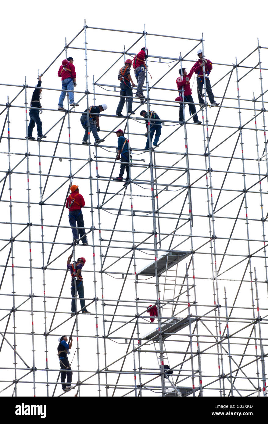 artistic workers on a high-rise scaffolding, Hong Stock Photo - Alamy
