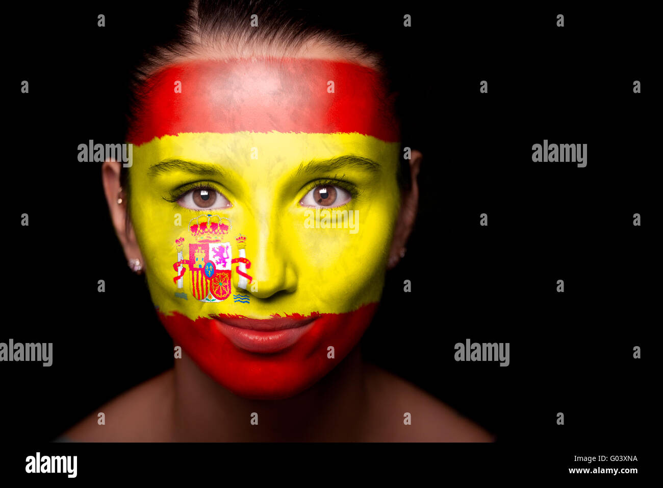 Human face painted with flag spanish hi-res stock photography and ...